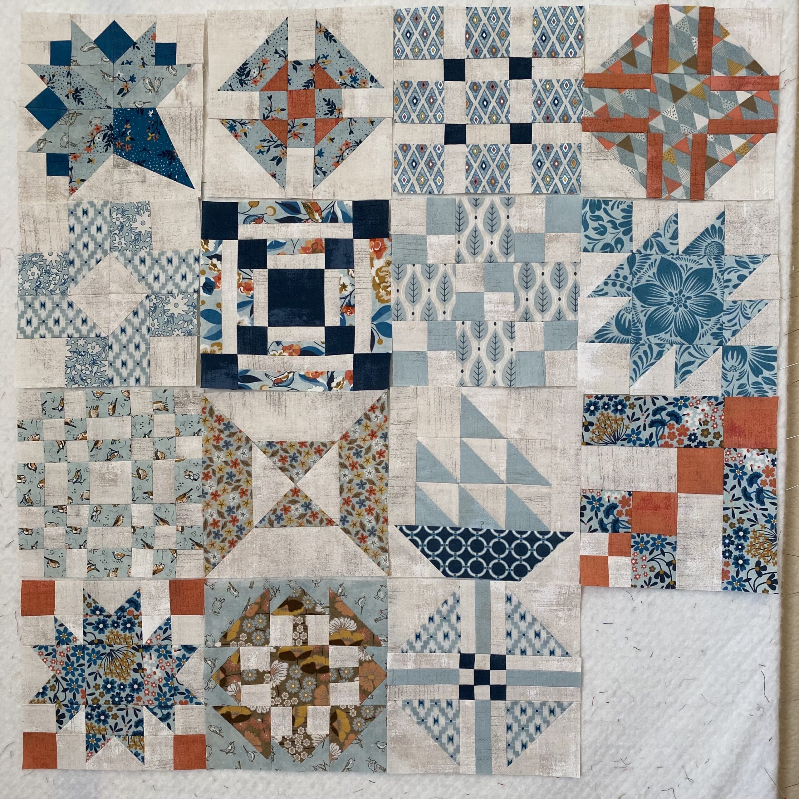 Sampler Spree Light Blue and Dark Orange Blocks - Sister’s Choice Quilts